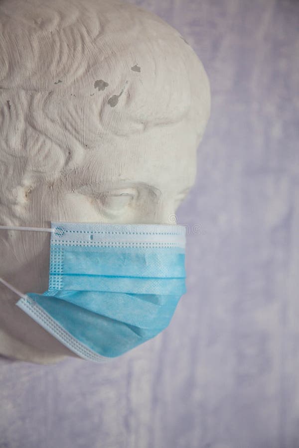 Protective Medical Mask Worn on an Old Roman Statue Stock Photo - Image ...