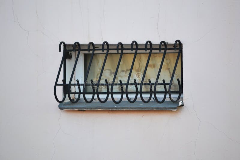 Protective Metal Bars on the Windows of the First Floor from the Street ...