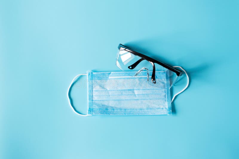 Protective Plastic Goggles and Disposable Sanitary Surgical Mask in ...