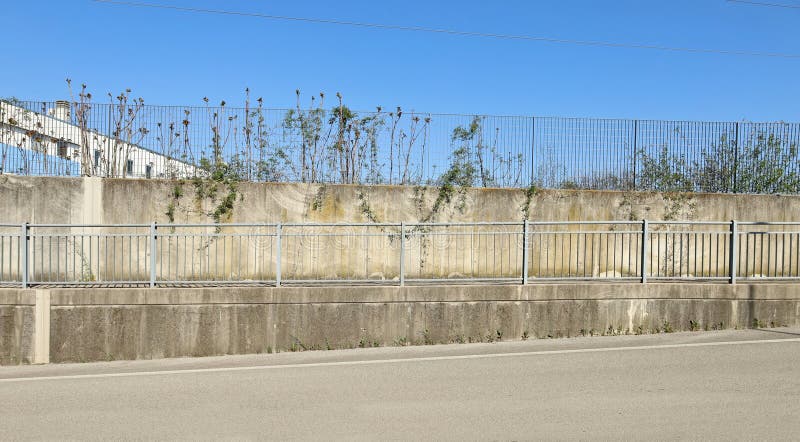 Protective Railing for Pedestrian Footpath. Road in Front and Concrete ...