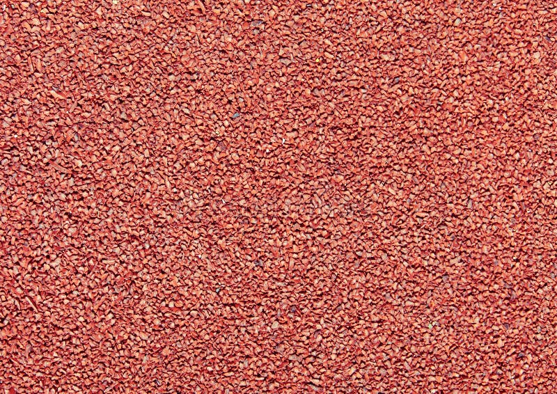 The Protective Red Coating of Crumb Rubber. Texture Safety Rubberized ...