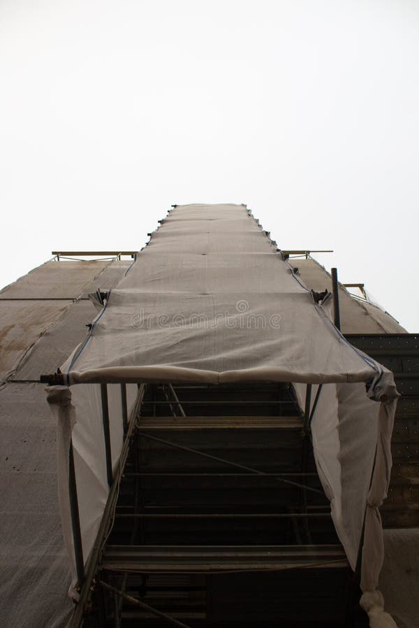 Protective Scaffolding of a Building Stock Image - Image of cables ...