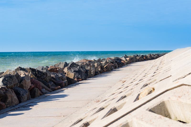 Protective Seawall Made of Concrete Blocks on the Coast Stock Image ...