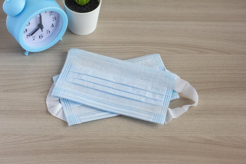 Protective Surgical Masks on the Table.Protection Against Viruses and ...