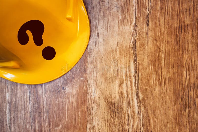 Protective Yellow Construction Helmet with Question Mark Stock Image ...