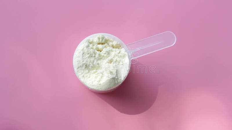 Protein Powder in a Scoop on Pink Background with Highlights. Stock ...
