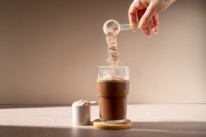Protein Shake and Chocolate Protein Powder in a Scoop, Food Supplement ...