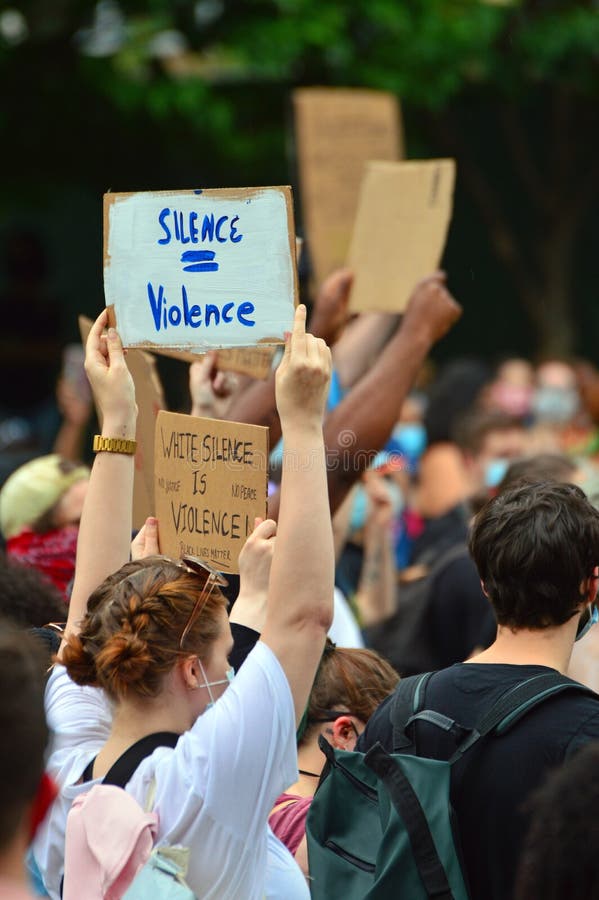 Protestors hold up signs editorial photography. Image of freedom ...