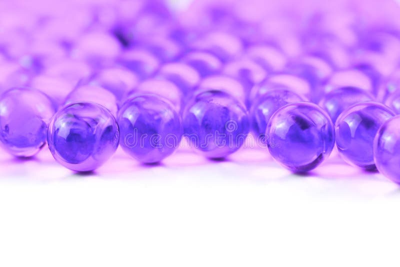 Proton Purple Spherical Ball Capsules with Selective Focus Isolated on ...