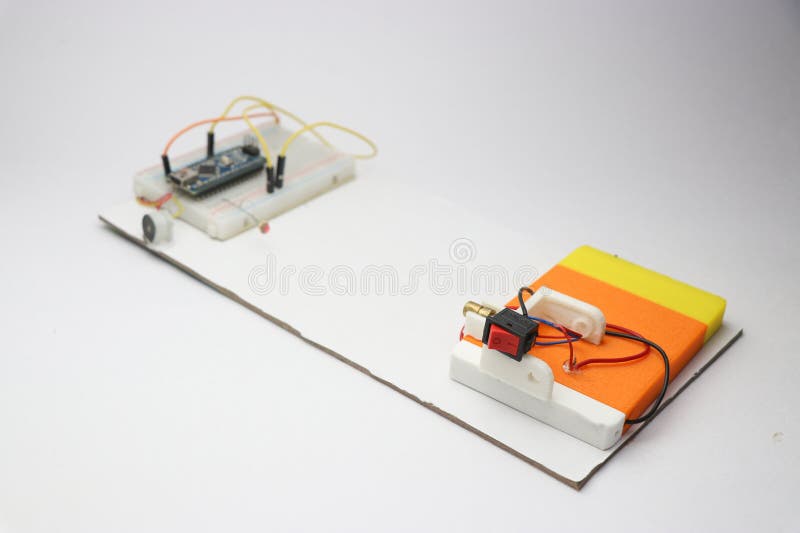 Prototype of a Laser Security Alarm Device Built on a Piece of Board ...