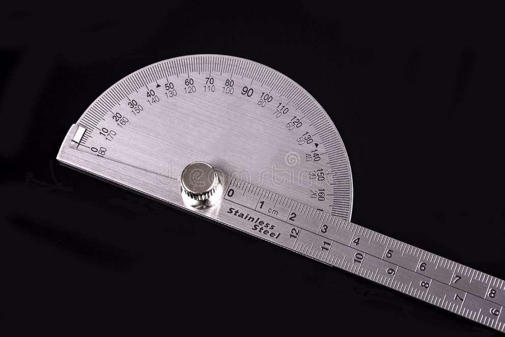 Protractor on black stock image. Image of gauge, meter - 44347983