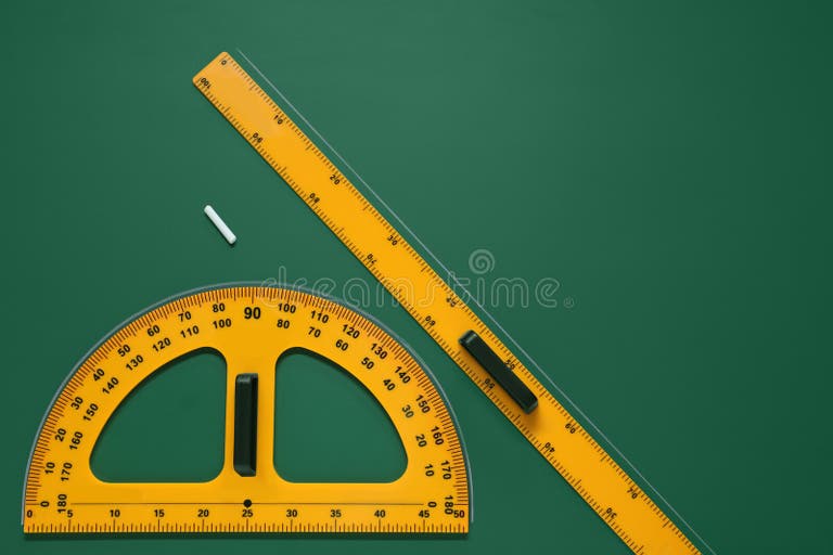 Protractor, Ruler and Chalk on Green Chalkboard, Flat Lay. Space for ...