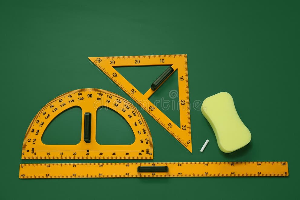 Protractor, Triangle, Ruler and Sponge on Green Chalkboard, Flat Lay ...
