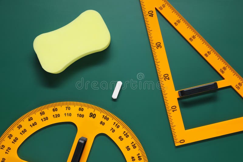 Protractor, Triangle, Sponge and Chalk on Green Chalkboard, Flat Lay ...