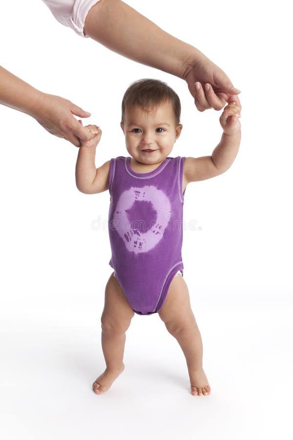 Proud Baby Girl Standing with Some Help Stock Photo - Image of human ...