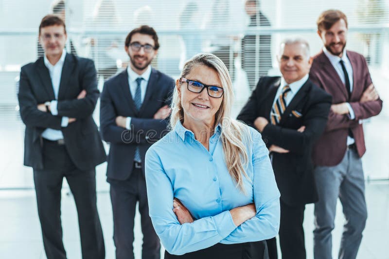 Proud Business Woman Standing in Front of a Business Team Stock Photo ... Proud Business Woman Standing in Front of a Business Team Stock Photo ...