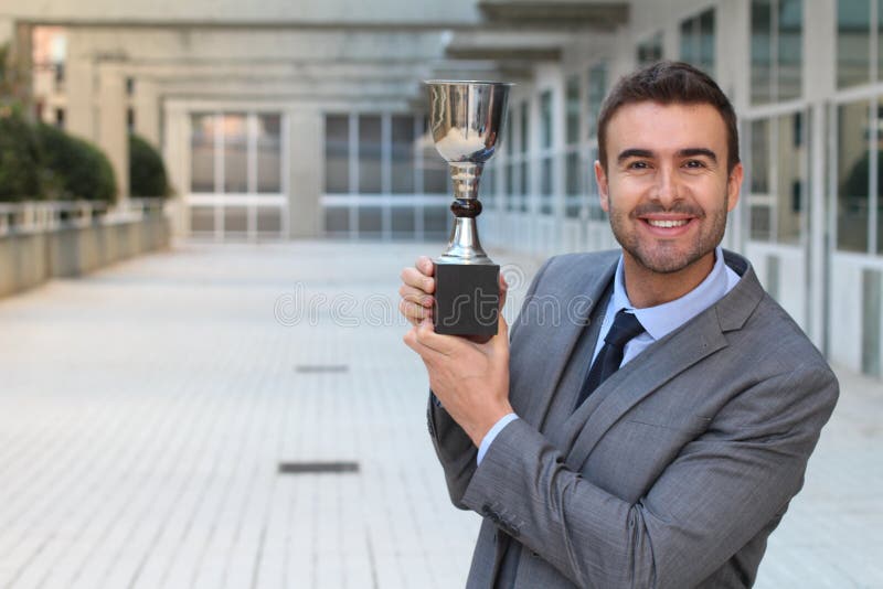 Proud Businessman Holding His Trophy Stock Photo - Image of male ...