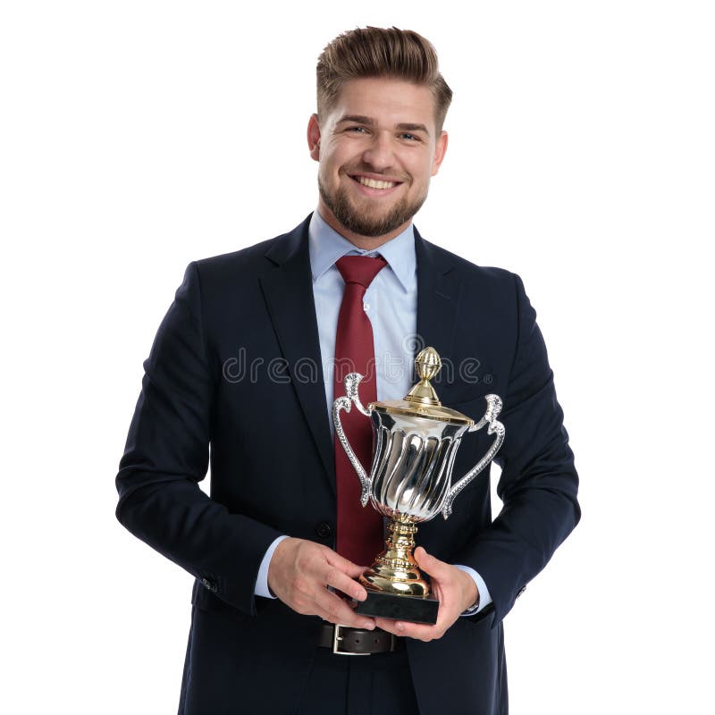 Proud Businessman Smiling and Presenting Trophy Stock Photo - Image of ... Proud Businessman Smiling and Presenting Trophy Stock Photo - Image of ...