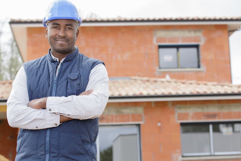 Proud and Confident Constructor Standing in Front New House Stock Image ...
