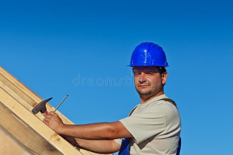 Proud Construction Worker on the Roof Stock Photo - Image of builder ...