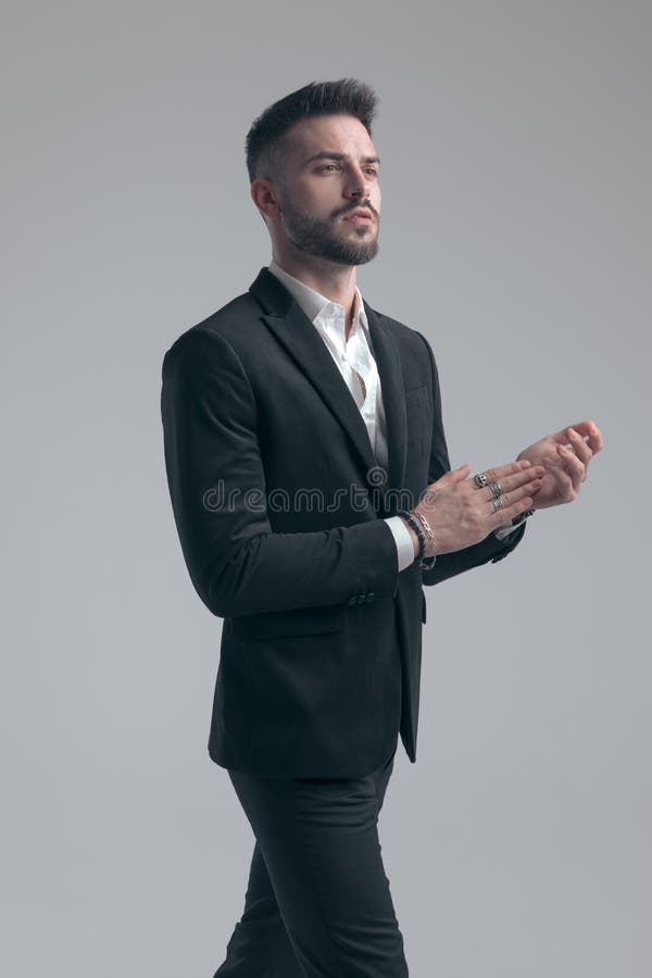 Proud Elegant Man Clapping and Looking Away Stock Image - Image of ...