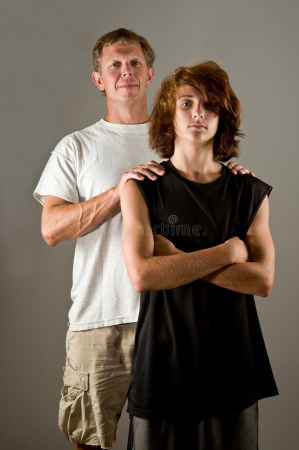 Proud Father of Teenage Son Stock Image - Image of hugging, studio ...