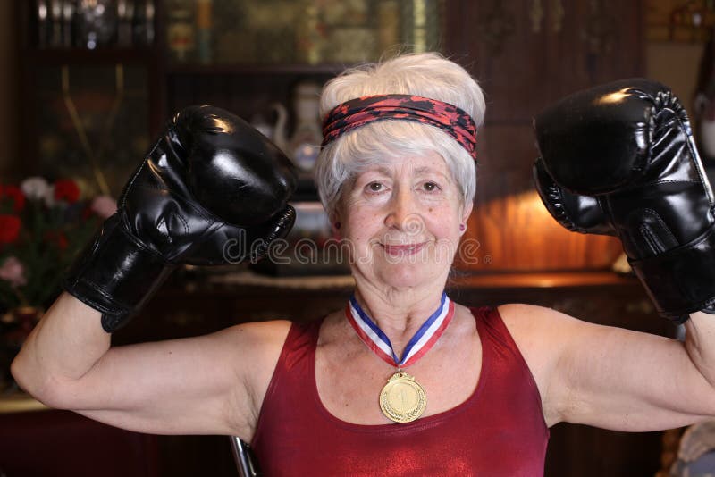 Proud Female Winner with Boxing Gloves Stock Photo - Image of elder ...