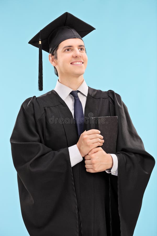 Proud Graduate Student Holding a Book Stock Photo - Image of happiness ...