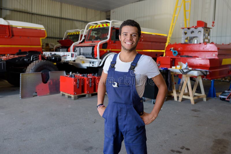 Proud mechanic in garage stock photo. Image of repair - 152075336