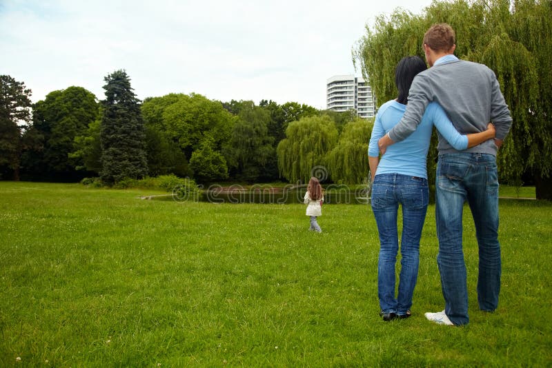 Proud parents stock image. Image of harmony, love, observation - 10961103