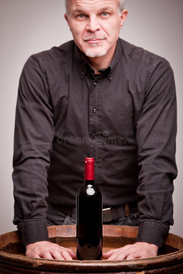 Proud Wine Maker Man with a Bottle Stock Photo - Image of genuine ...
