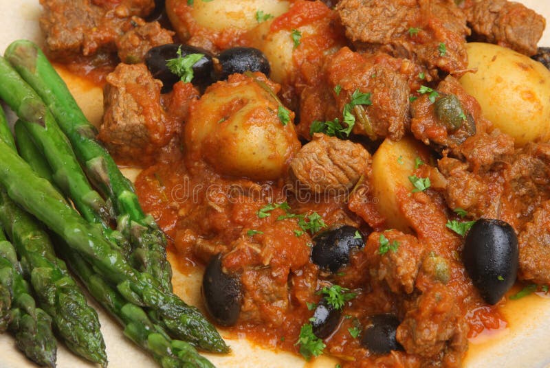 Provencal Beef Stew with Asparagus Stock Image - Image of olive, capers ...
