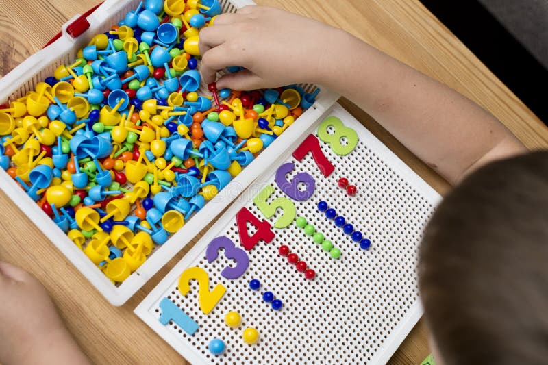 By Provided Numbers Boy Inserting Pins. Counting Game. Mathematical ...