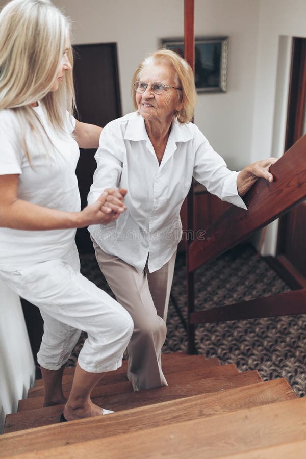 Providing Help and Support for Elderly Stock Photo - Image of daughter ...