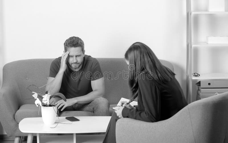 Psychologist Helping Young Man To Solve Men Problems. Depressed Middle ...