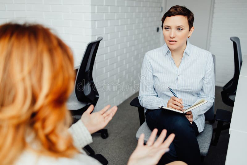 A Psychologist Meets with a Client in the Office Stock Photo - Image of ...