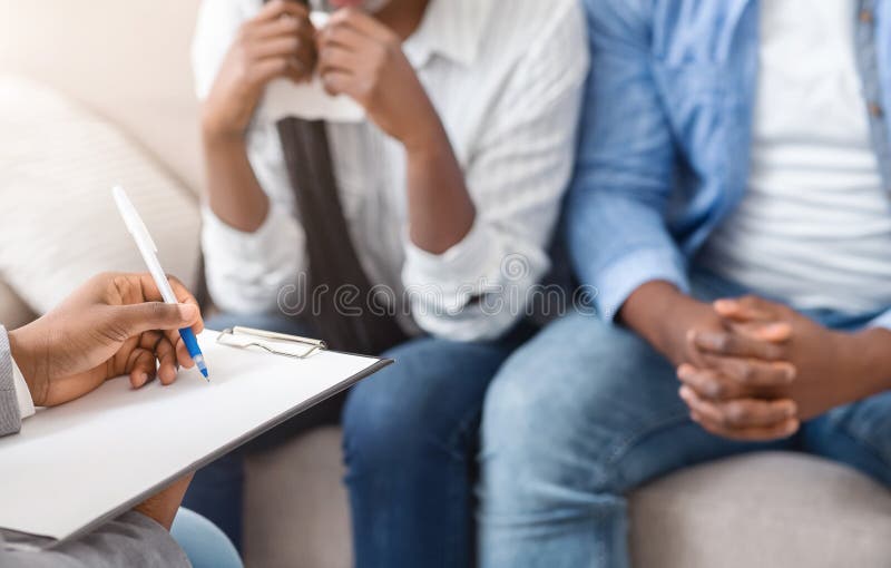 Psychologist Taking Notes on Marital Therapy Session for Young Afro ...