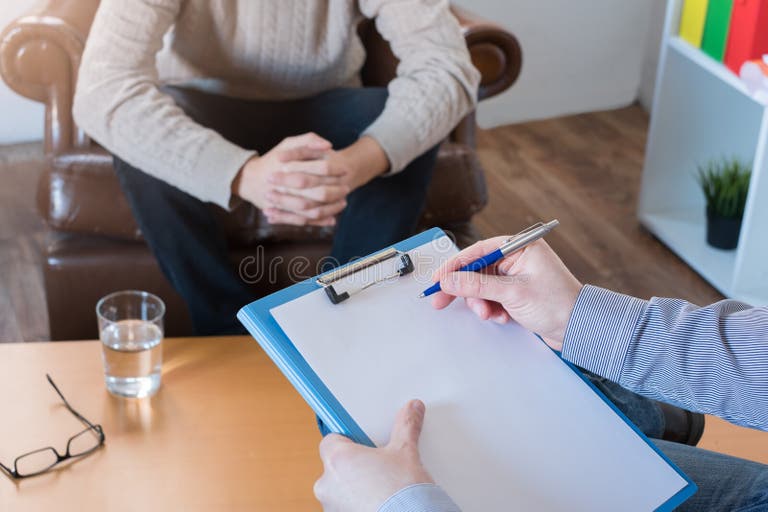 Psychologist Taking Notes during Psychotherapy Stock Image - Image of ...