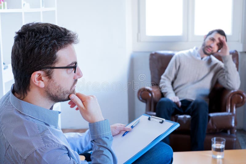 Psychologist Taking Notes during Psychotherapy Stock Photo - Image of ...