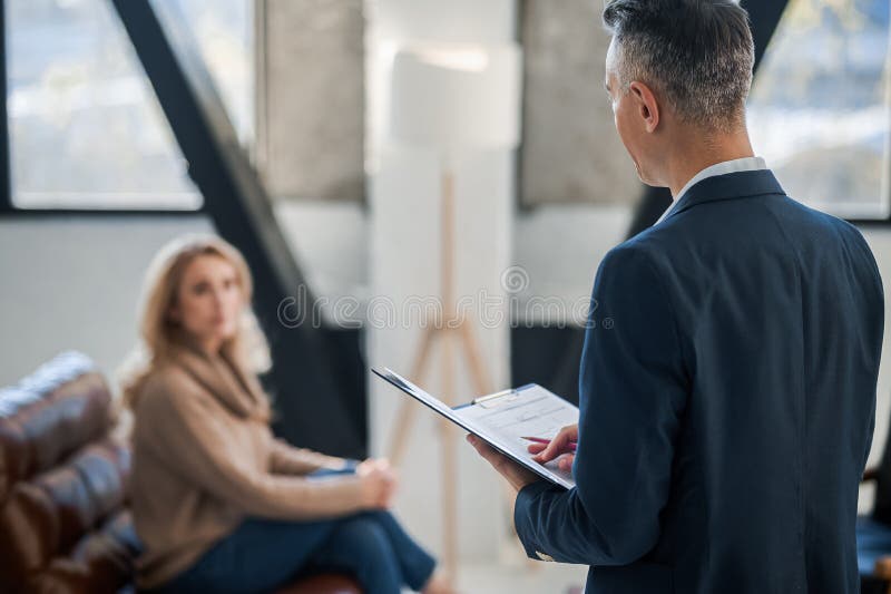 Psychologist Taking To a Client and Making Notes Stock Photo - Image of ...