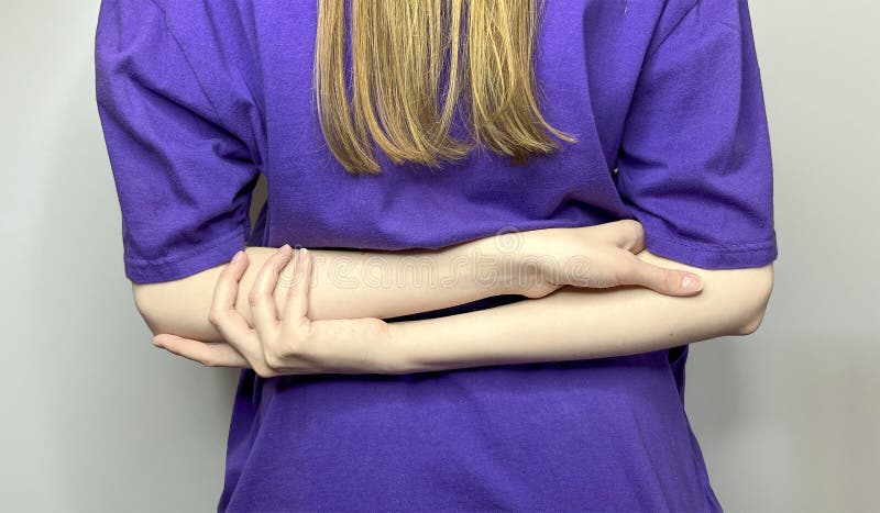 In Psychology, a Closed Pose with Folded Hands Behind Your Back Stock ...