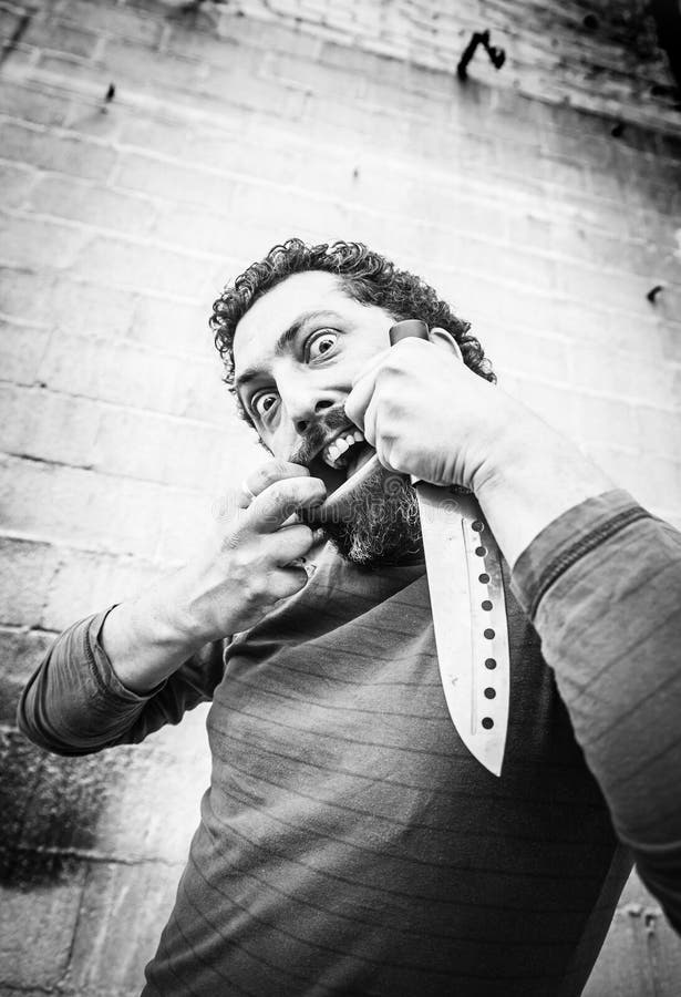 Psychopath with knife stock photo. Image of crazy, feeling - 80513022