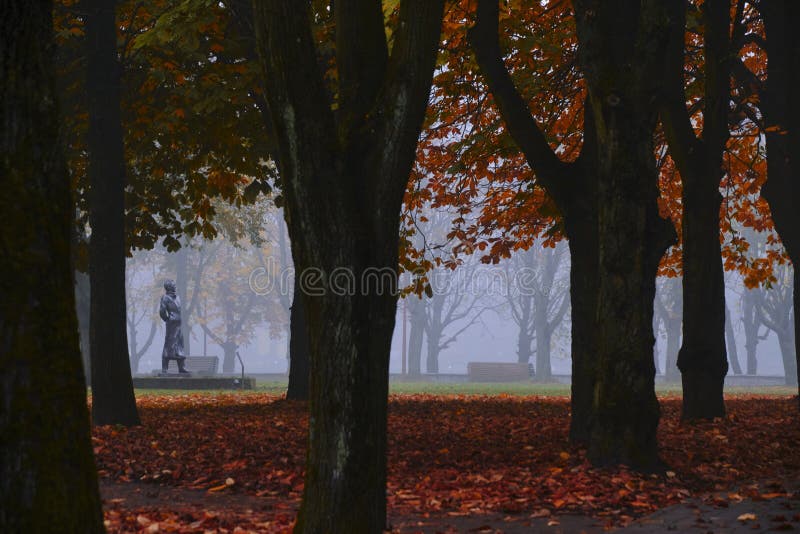 Public Autumn Park with Chestnut Trees and Falling Orange Foliage ...