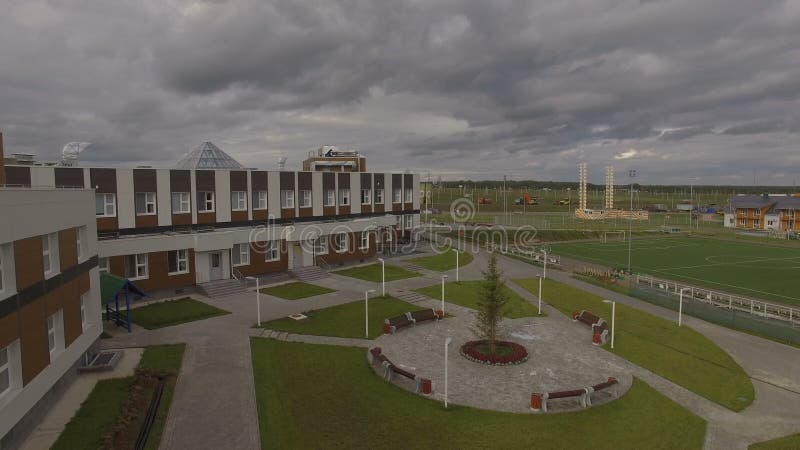 Beautiful Facade of White Temple with Green Roofs and with Golden Domes ...