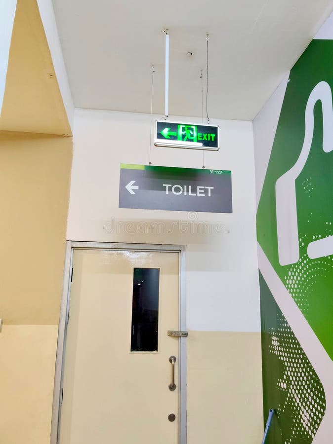 Essential Public Building Interior Signs Guiding People To Restroom and ...