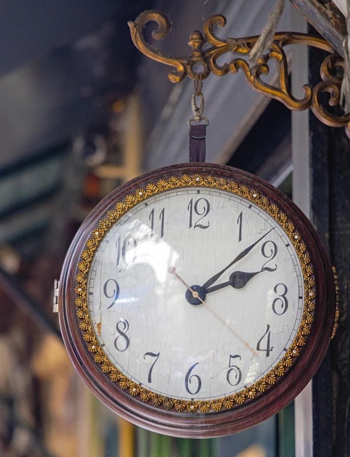 Public Clock Wall Hanging stock image. Image of exterior - 319124023