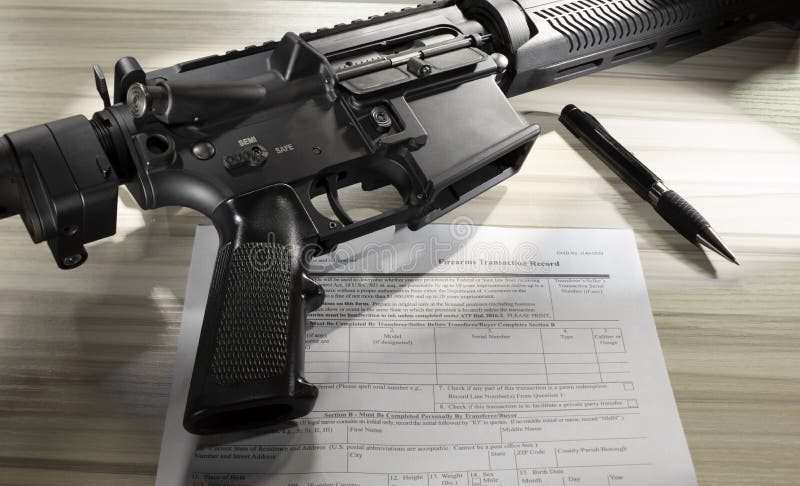 Public Domain Background Check Form with AR-15 Stock Photo - Image of ...