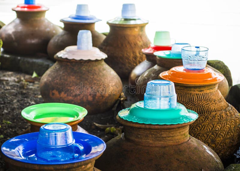 Clay Pot With Water For Drinking On Street Stock Photo - Image of clay ...