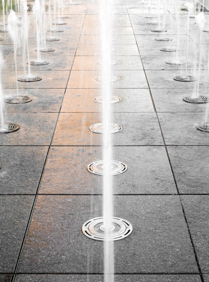 Public Fountain with Water Splash Stock Photo - Image of fresh, tile ...