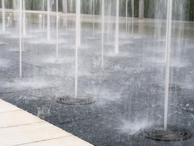 Public Fountain with Water Splash Stock Photo - Image of landmark, fall ...